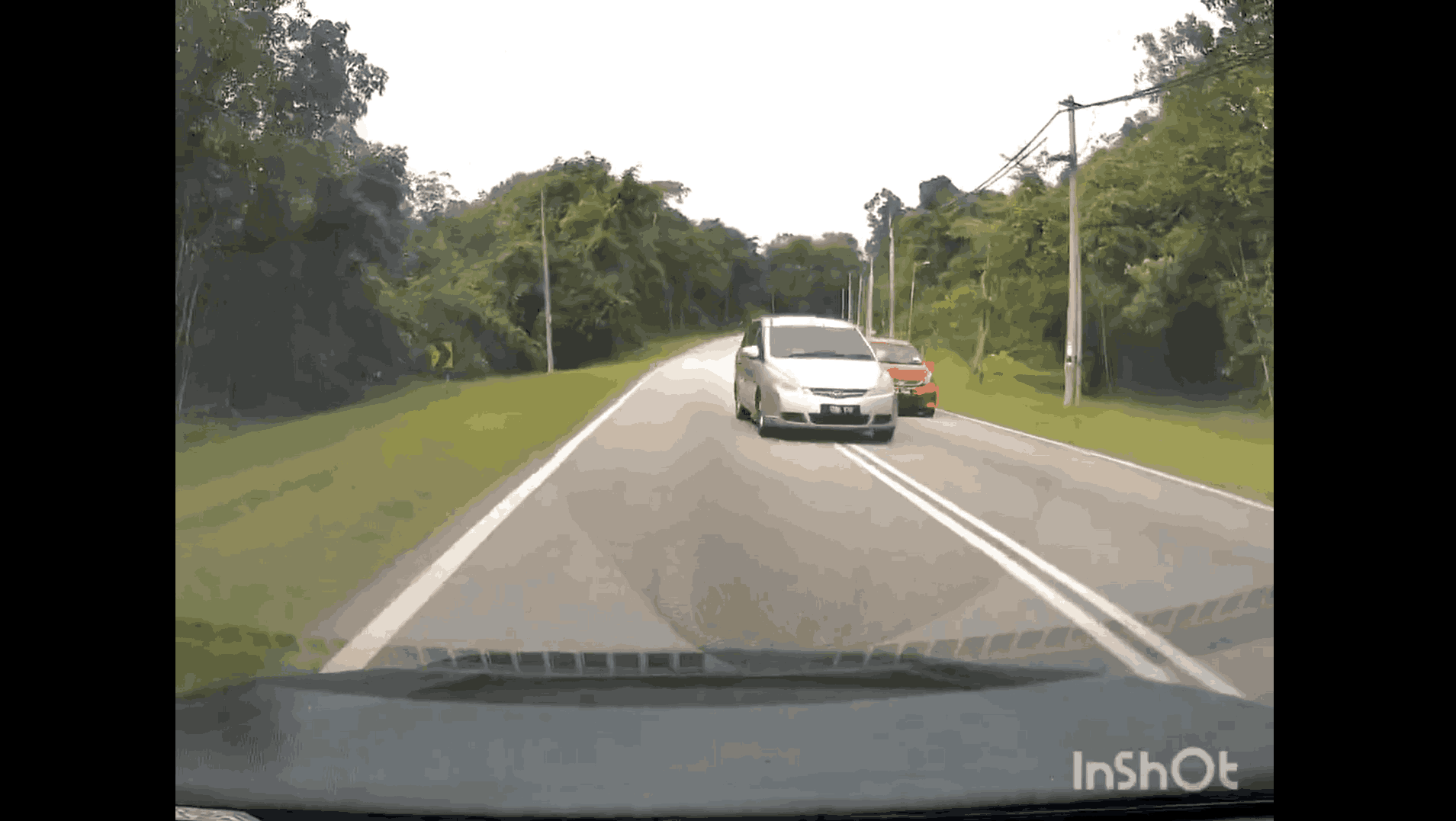 An SUV was spotted crossing the double line and nearly colliding with ...