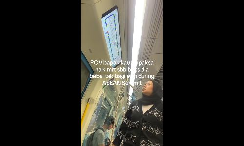 Daughter teaches dad how to use MRT ahead of ASEAN Summit - _sha66