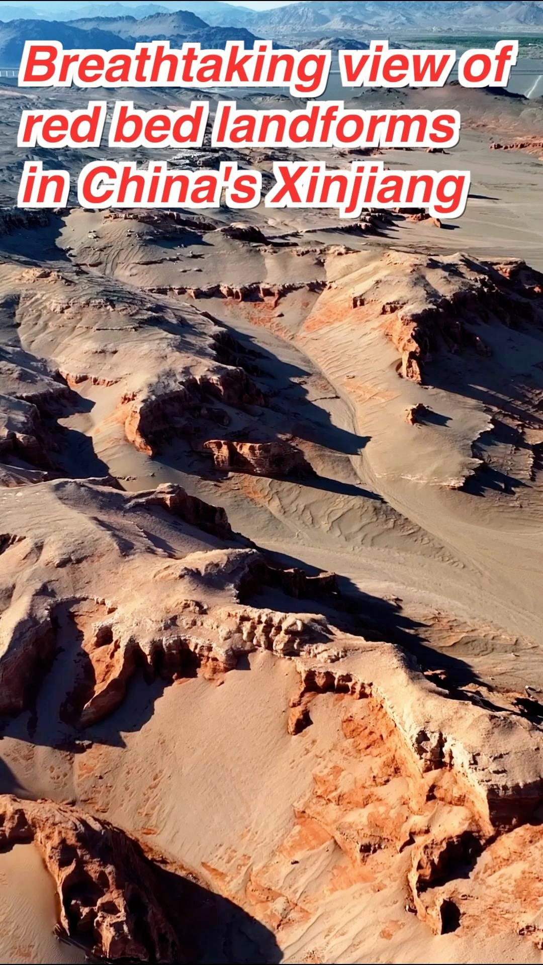 Breathtaking view of red bed landforms in China's Xinjiang