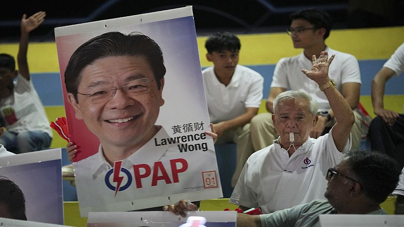 Singapore's ruling party wins another landslide in general elections extending its 66-year rule