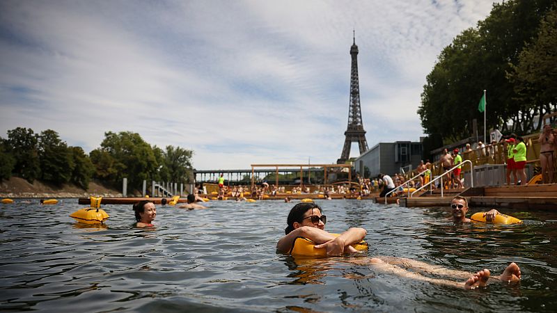 Watch: Parisians swim in Seine for the first time in 100 years